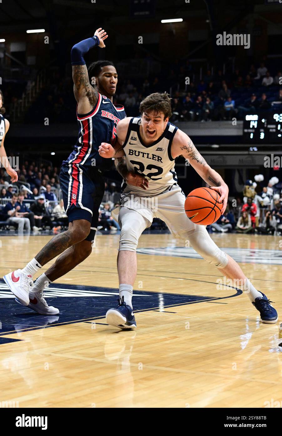 Butler forward Patrick McCaffery (22) pushes against St. John's guard ...