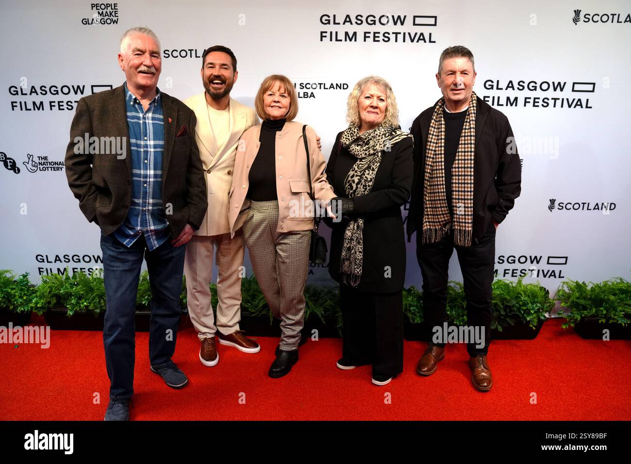 Martin Compston (second left) with members of his family, arriving for ...