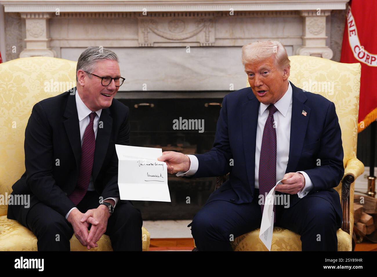 US President Donald Trump is presented with a letter from King Charles ...