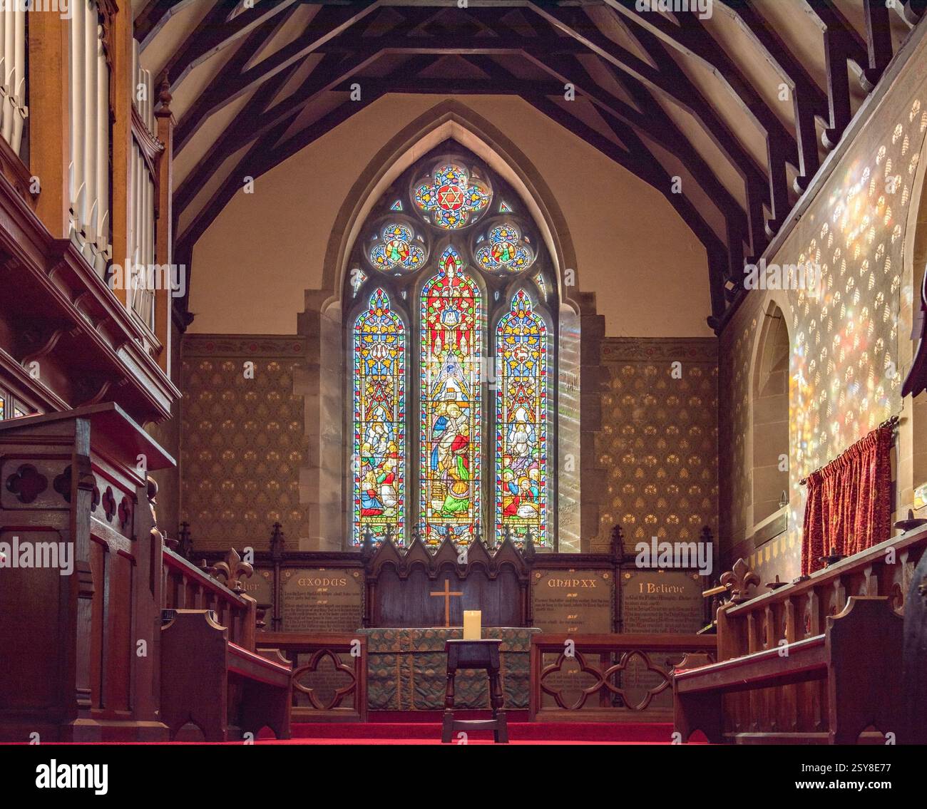 The altar and East window in the church of St John the Evangelist in ...