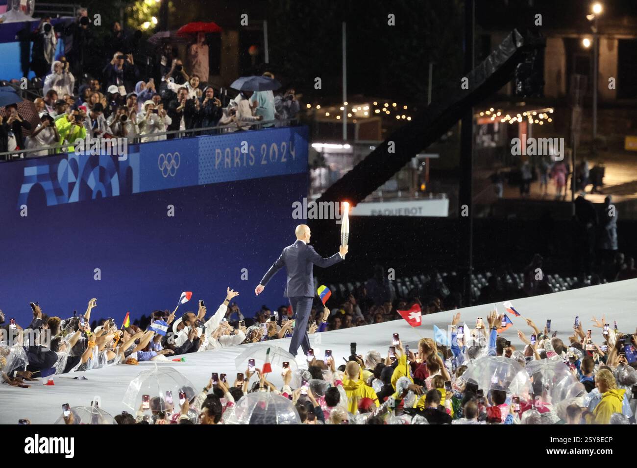 July 26th, 2024 - Paris, France: Zinedine Zidane of France carries the ...