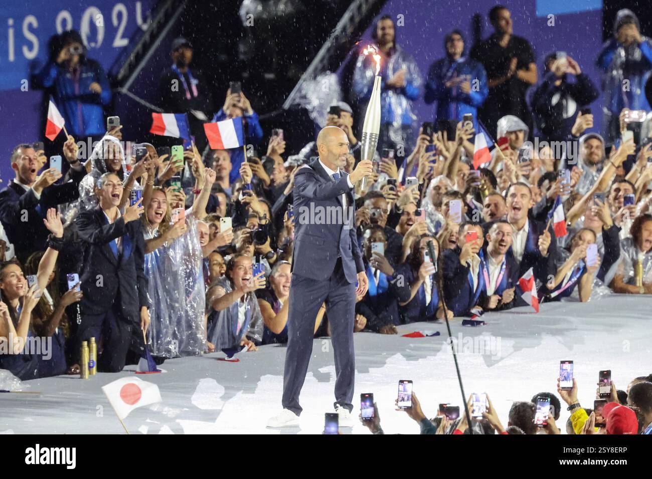 July 26th, 2024 - Paris, France: Zinedine Zidane of France carries the ...