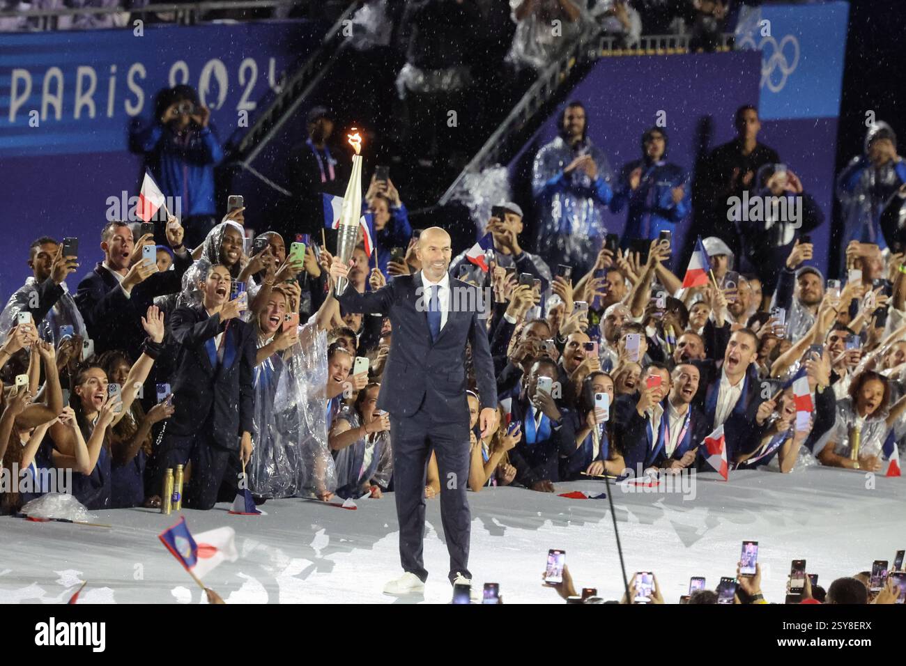 July 26th, 2024 - Paris, France: Zinedine Zidane of France carries the ...