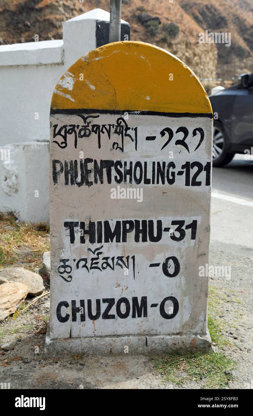 Old road sign in Bhutan Stock Photo - Alamy