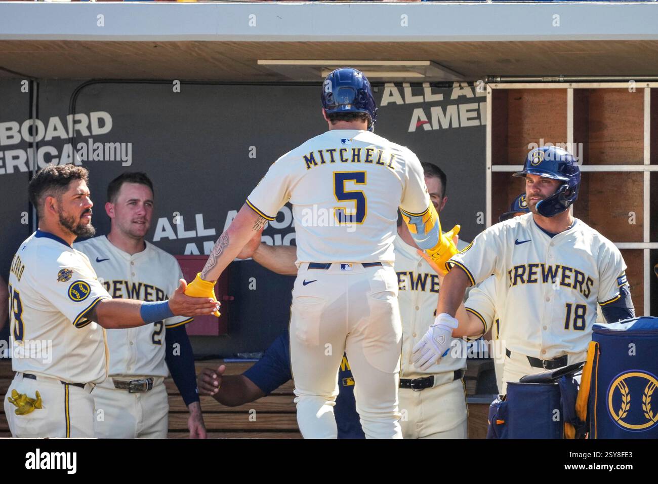 Milwaukee Brewers outfielder Garrett Mitchell (5) is greeted by ...