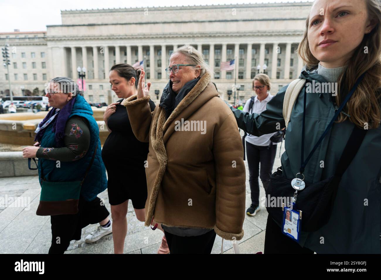 Lucy Mize, second from right, a United States Agency for International ...