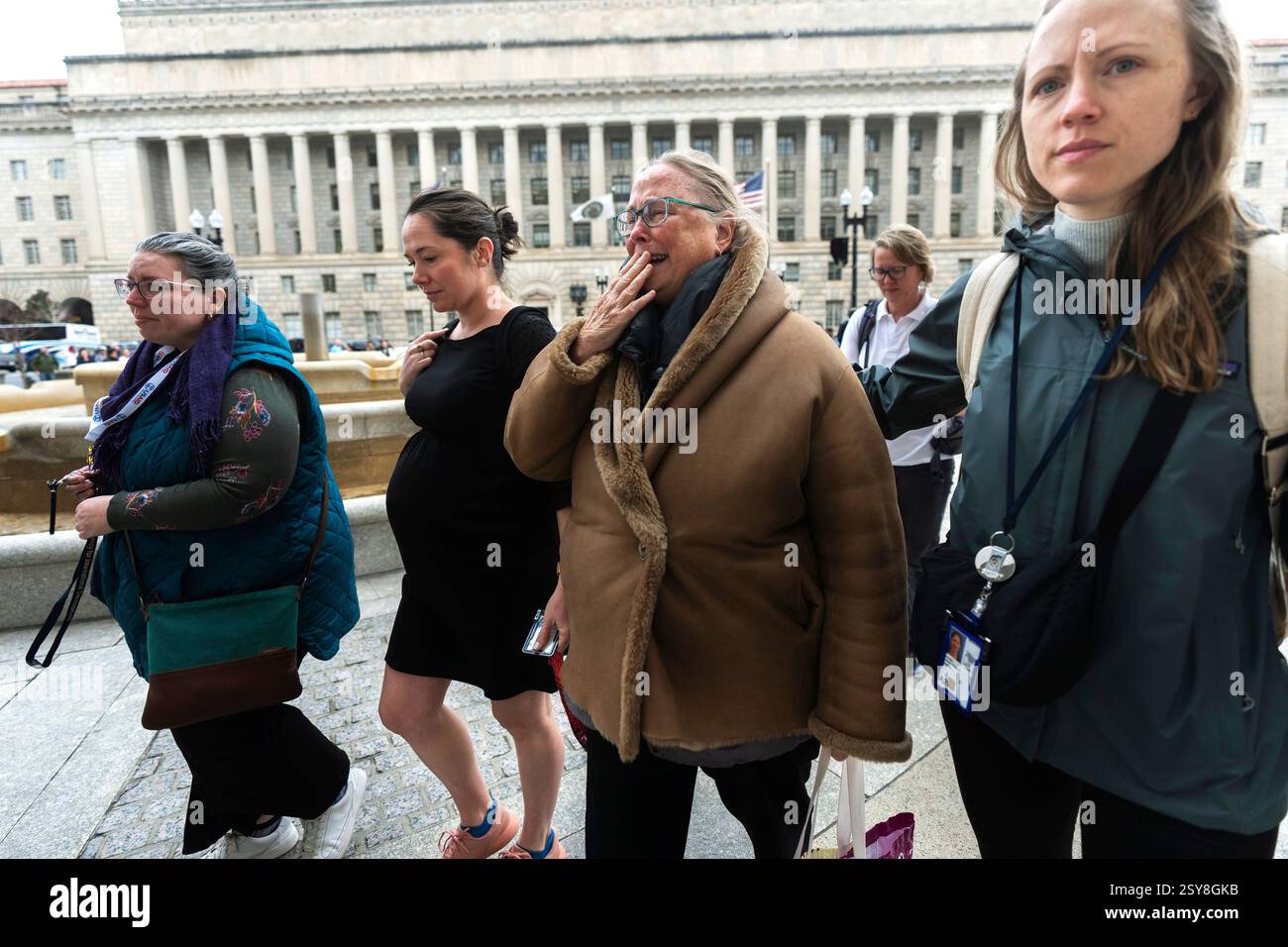 Lucy Mize, second from right, a United States Agency for International ...