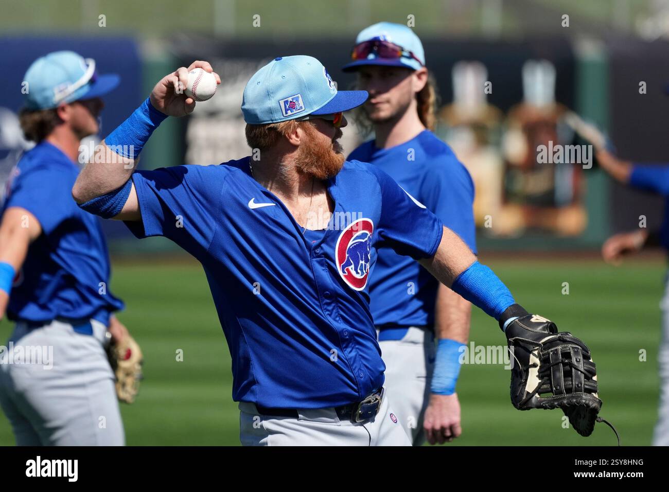 Chicago Cubs first baseman Justin Turner warms up prior to a spring ...