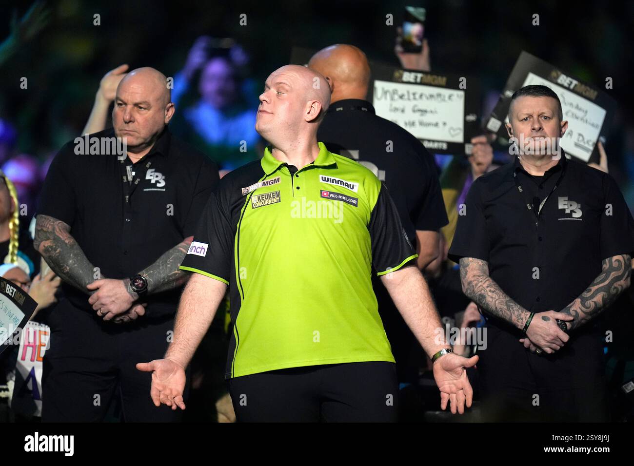 Michael van Gerwen walks to the oche during night four of the BetMGM Premier League at Westpoint ...