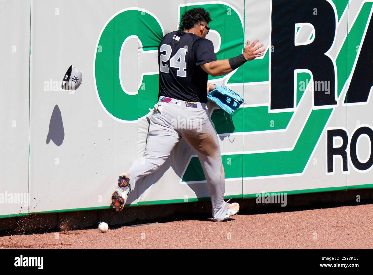 New York Yankees left fielder Jasson Dominguez (24) collides with the ...