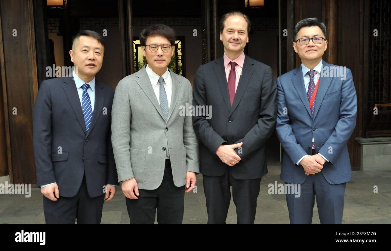 L-R: Alan Yang (Chinese Eastern Airlines), Pengliang Lu (Met Museum), Max Hollein (Met Museum ...