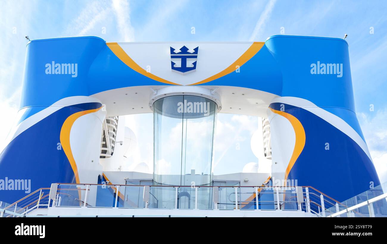 Futuristic glass skydiving iFly with a blue and white color scheme on ...