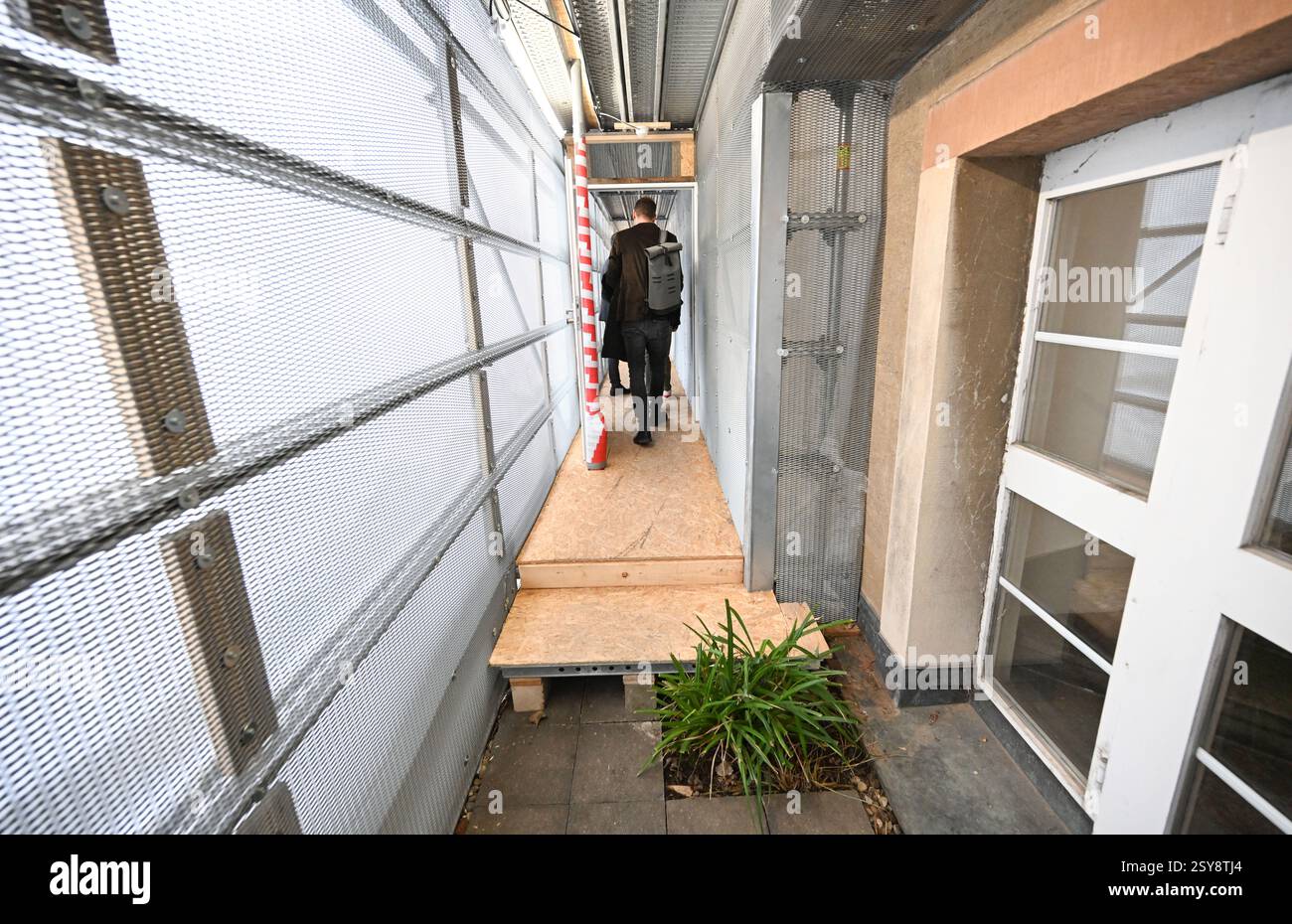 Stuttgart, Germany. 26th Feb, 2025. A temporary corridor through which ...