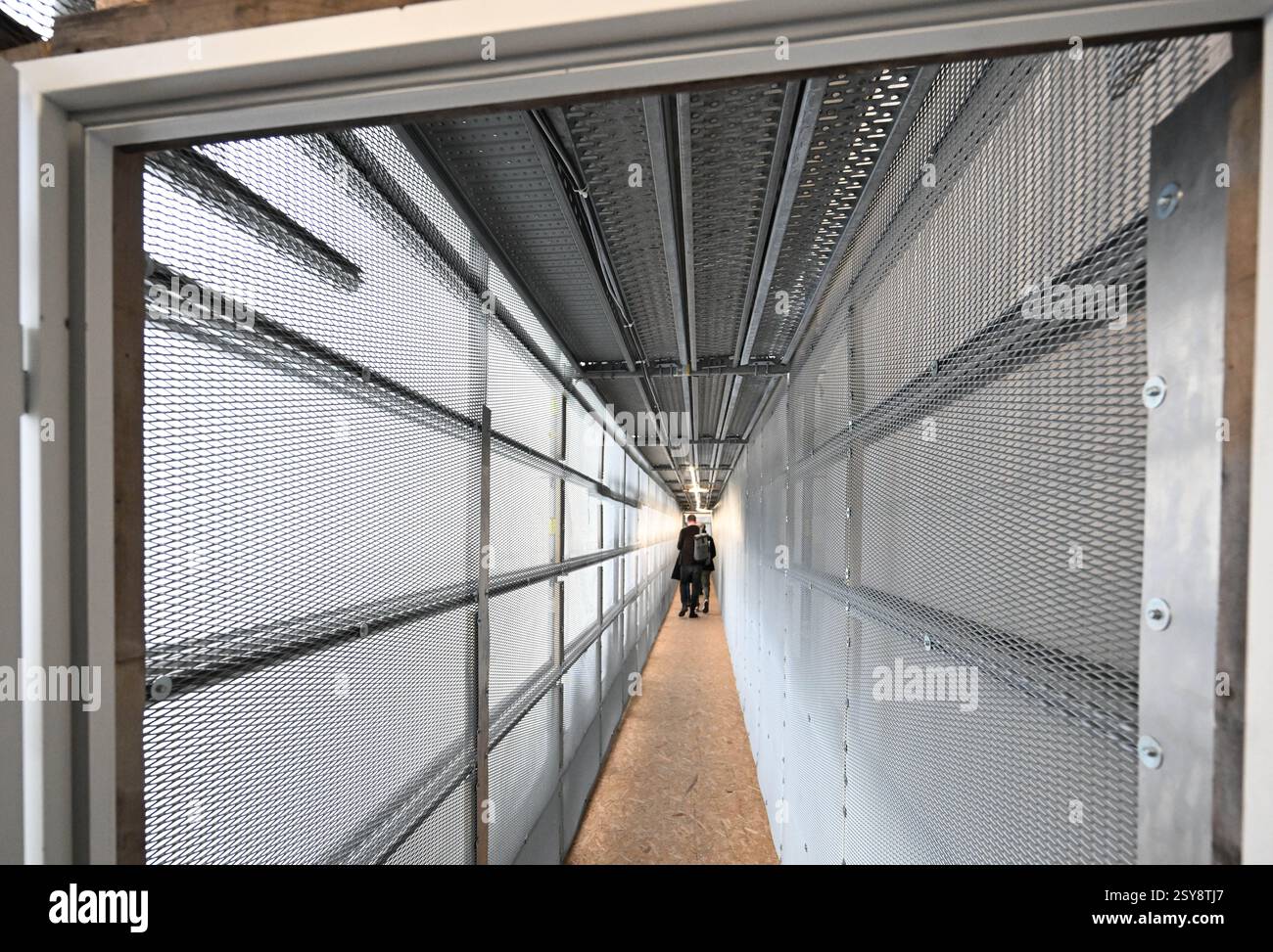 Stuttgart, Germany. 26th Feb, 2025. A temporary corridor through which ...