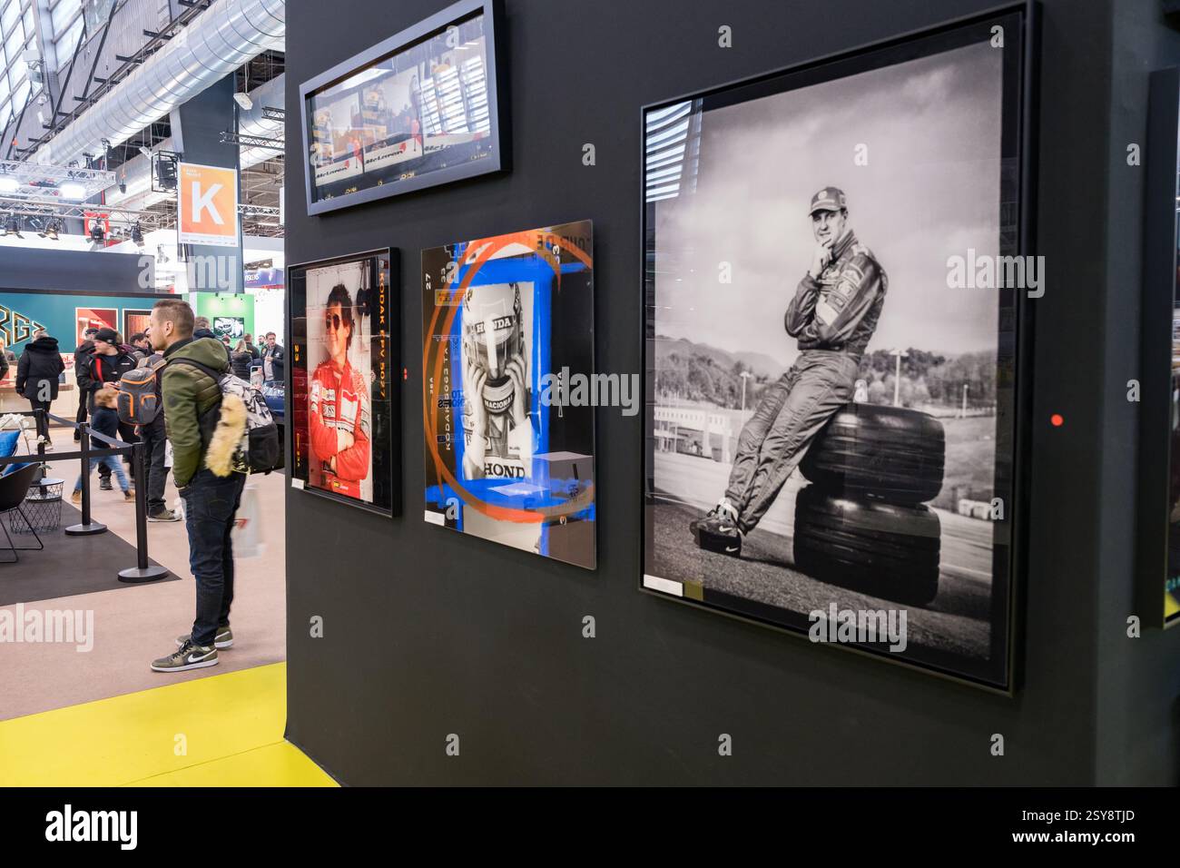 Racing legends showcased in a vibrant gallery at a motorsport event in ...