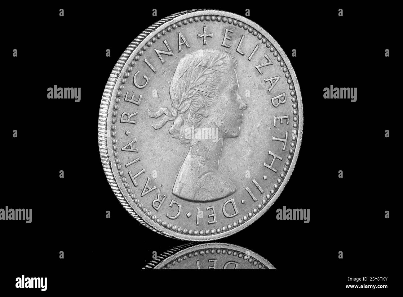 Queen Elizabeth II shown on the obverse of a One Shilling coin Stock ...