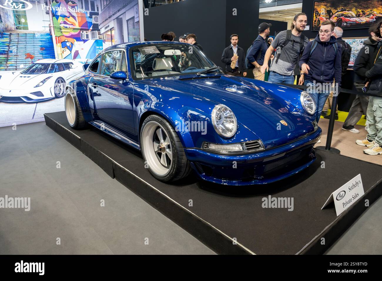 Iconic classic sports car showcased at an automotive exhibition ...