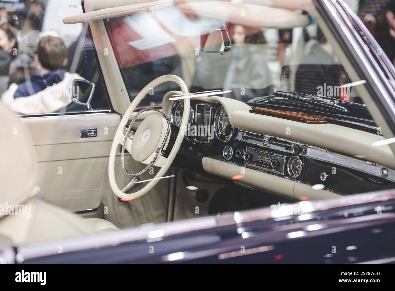 Classic luxury car interior with elegant design showcased at an auto ...