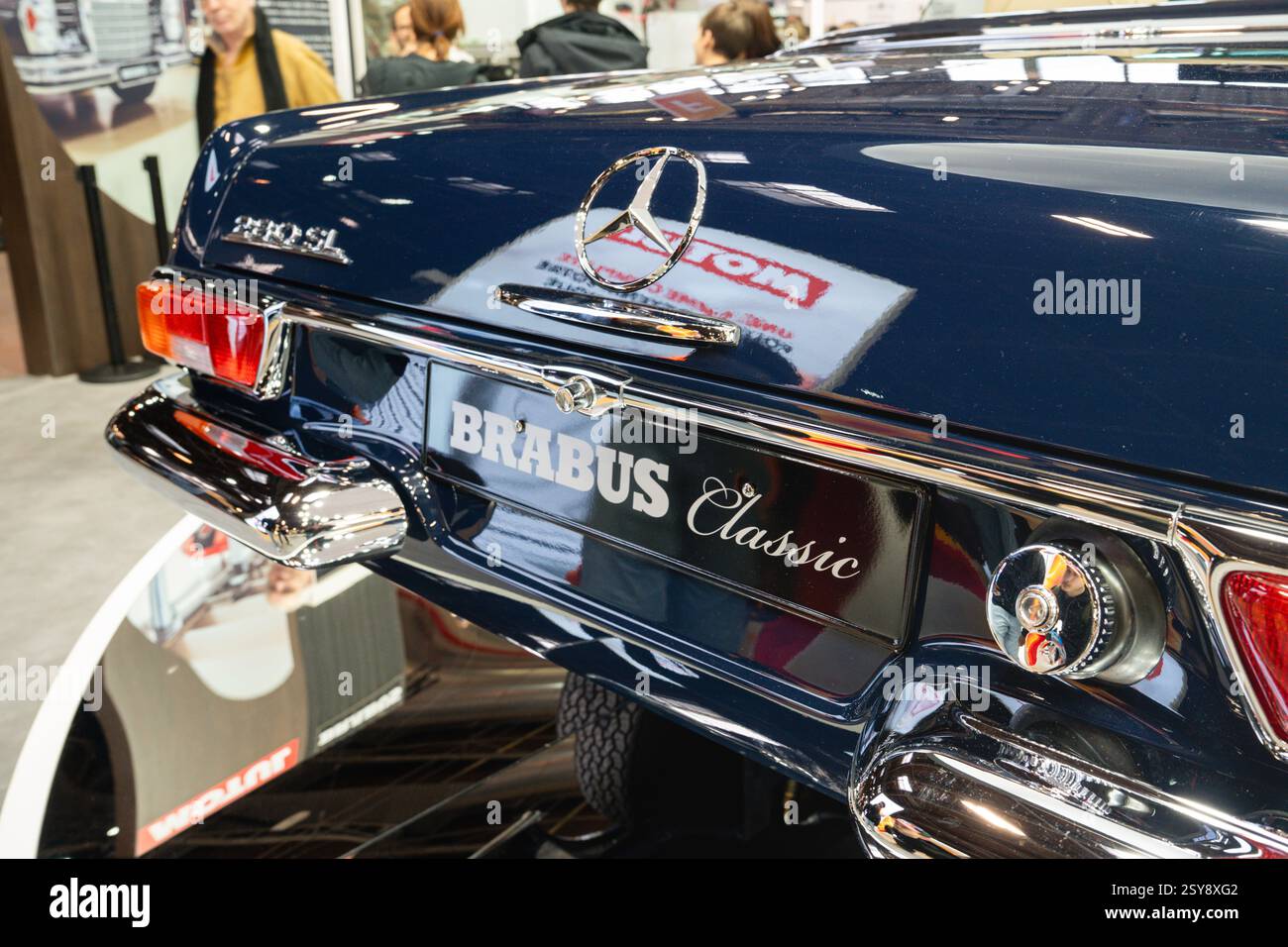 Classic elegance radiates from a vintage luxury car at an exhibition ...