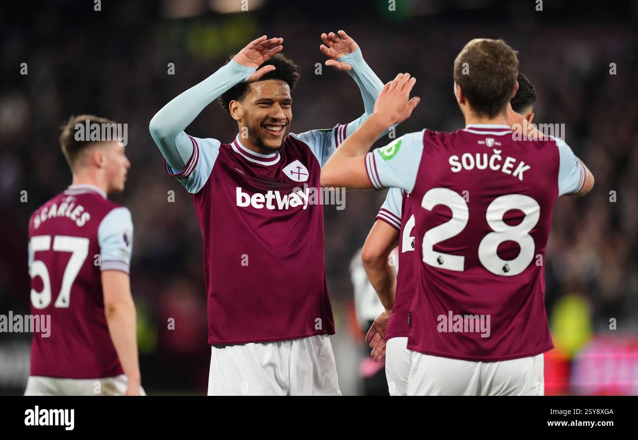 West Ham United's Jean-Clair Todibo (centre) celebrates with scorer ...