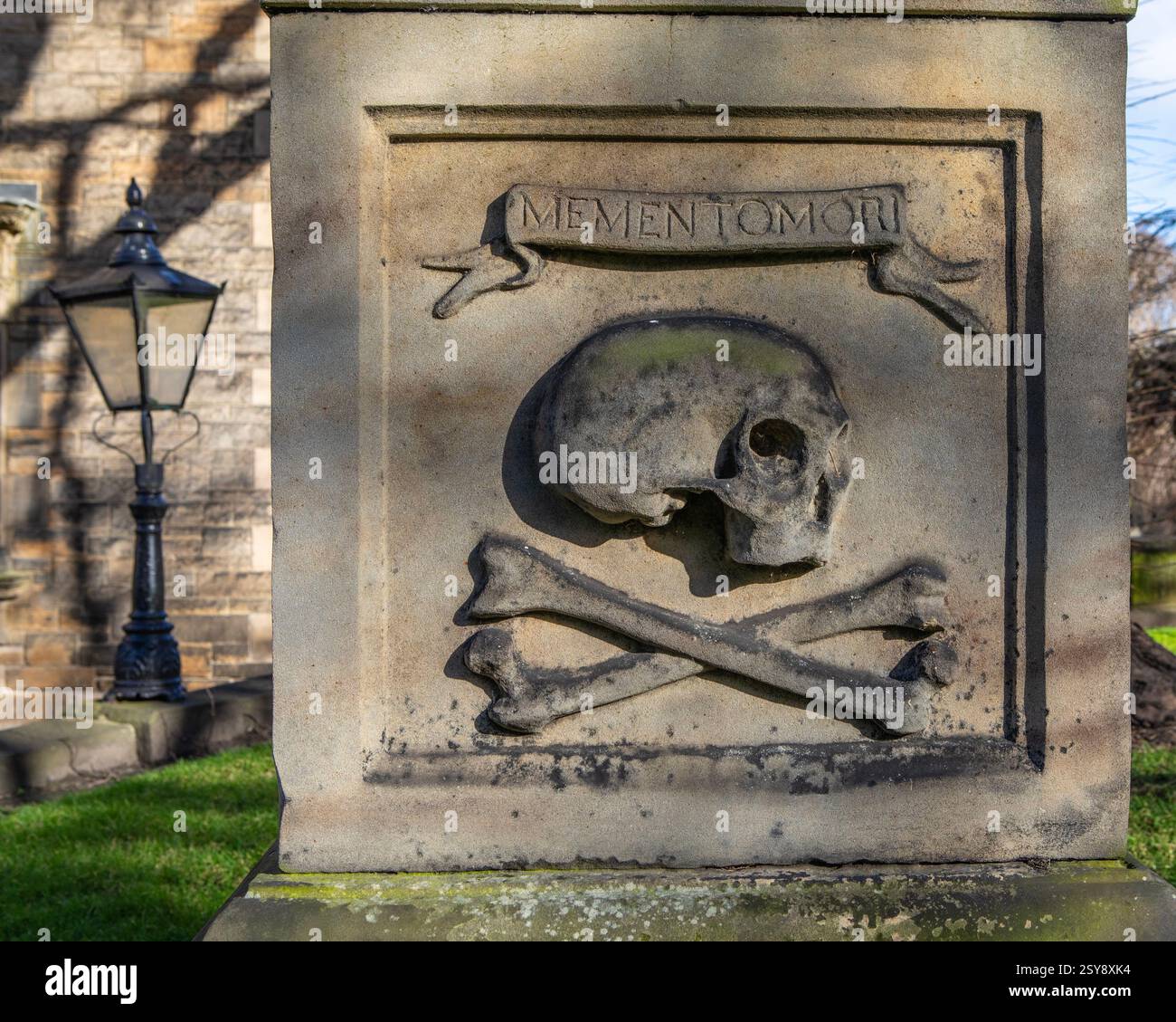 Close-up of a gravestone portraying a skull and crossbones, in St ...