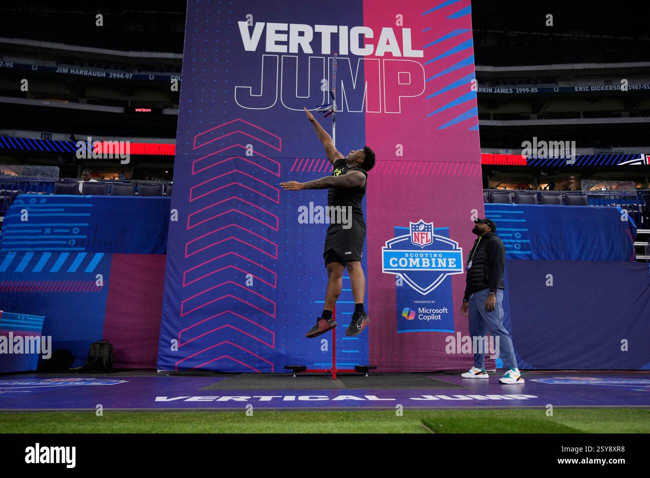 Arkansas defensive lineman Eric Gregory participates in vertical jump ...