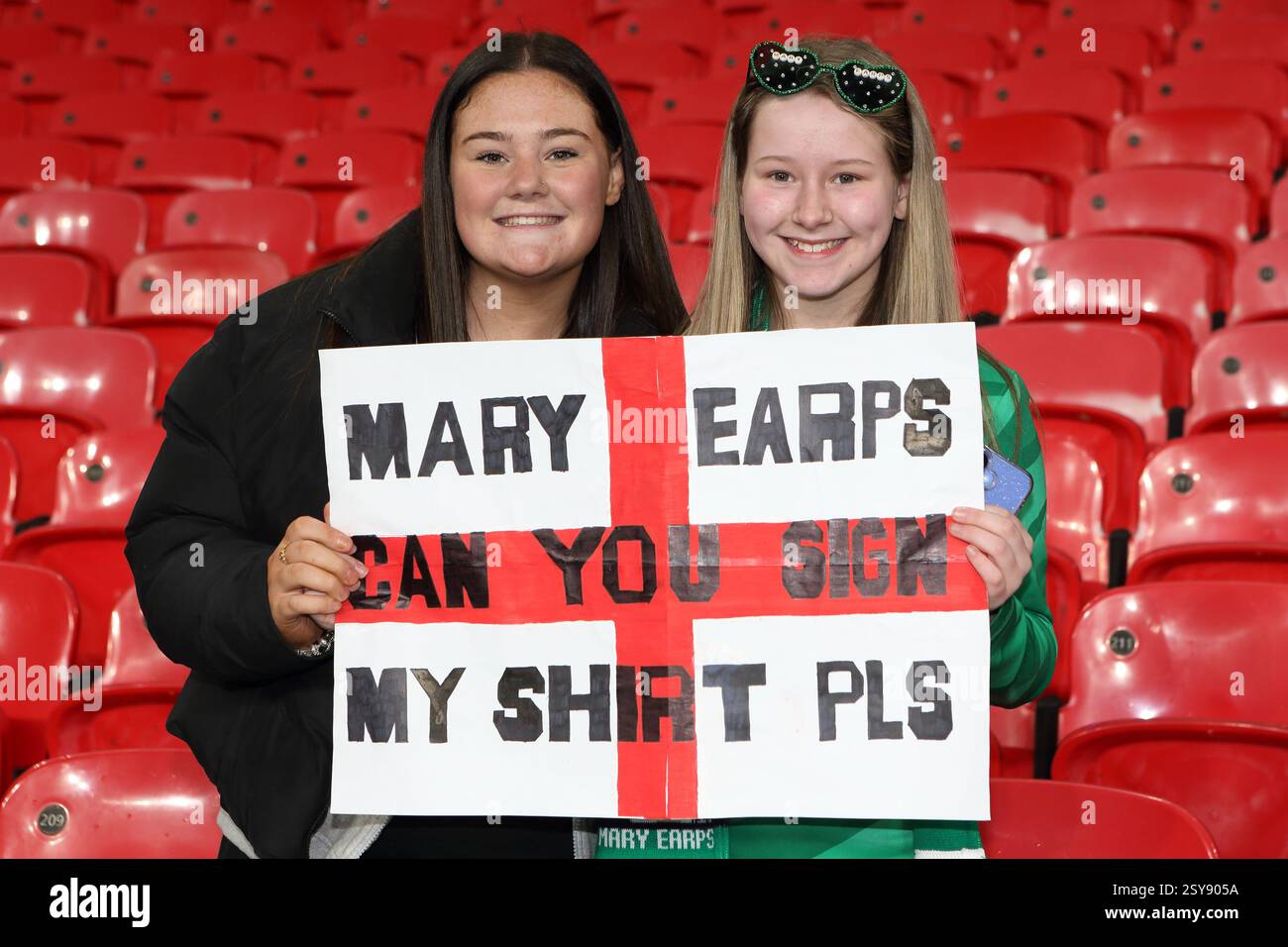 Women's football fans with placard of St George England Lionesses v ...