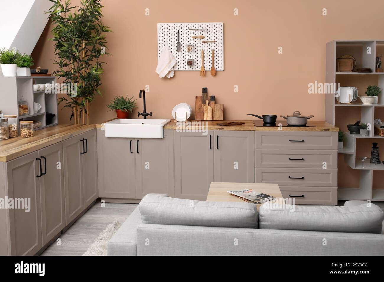 Cozy interior of kitchen in trendy colors of 2025 year Stock Photo - Alamy