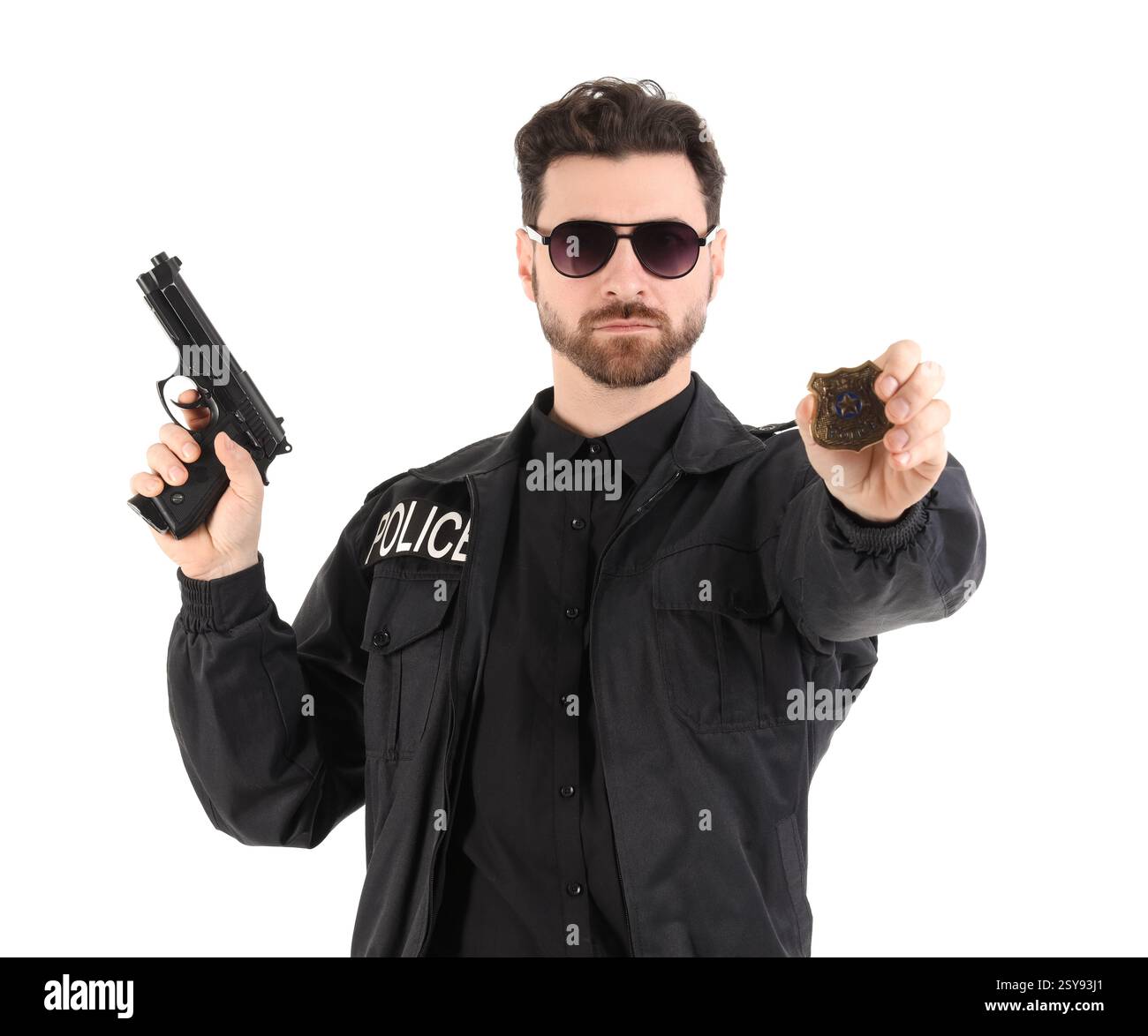 Male police officer with gun showing badge on white background Stock ...