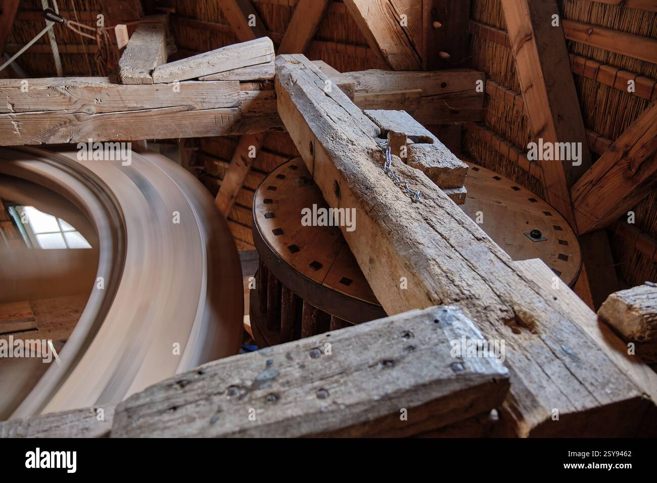 A close-up of the spinning spur wheel and stone wheel inside Concordia ...