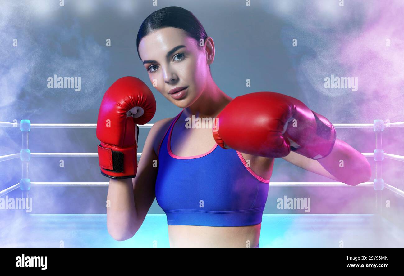 Boxer training on boxing ring in color smoke Stock Photo - Alamy
