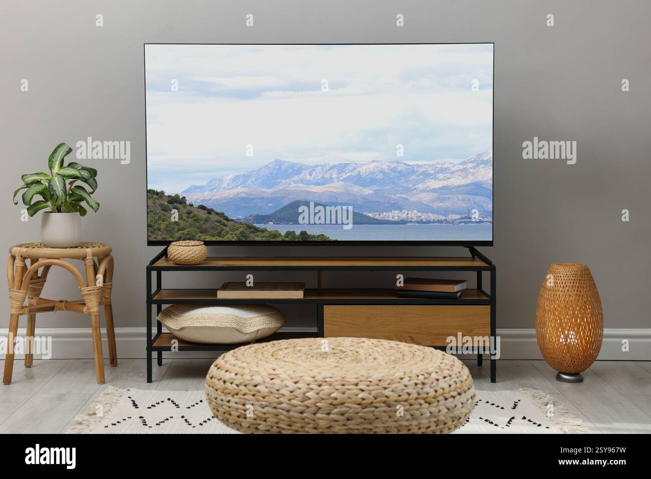 TV set with nature landscape on screen in room Stock Photo - Alamy