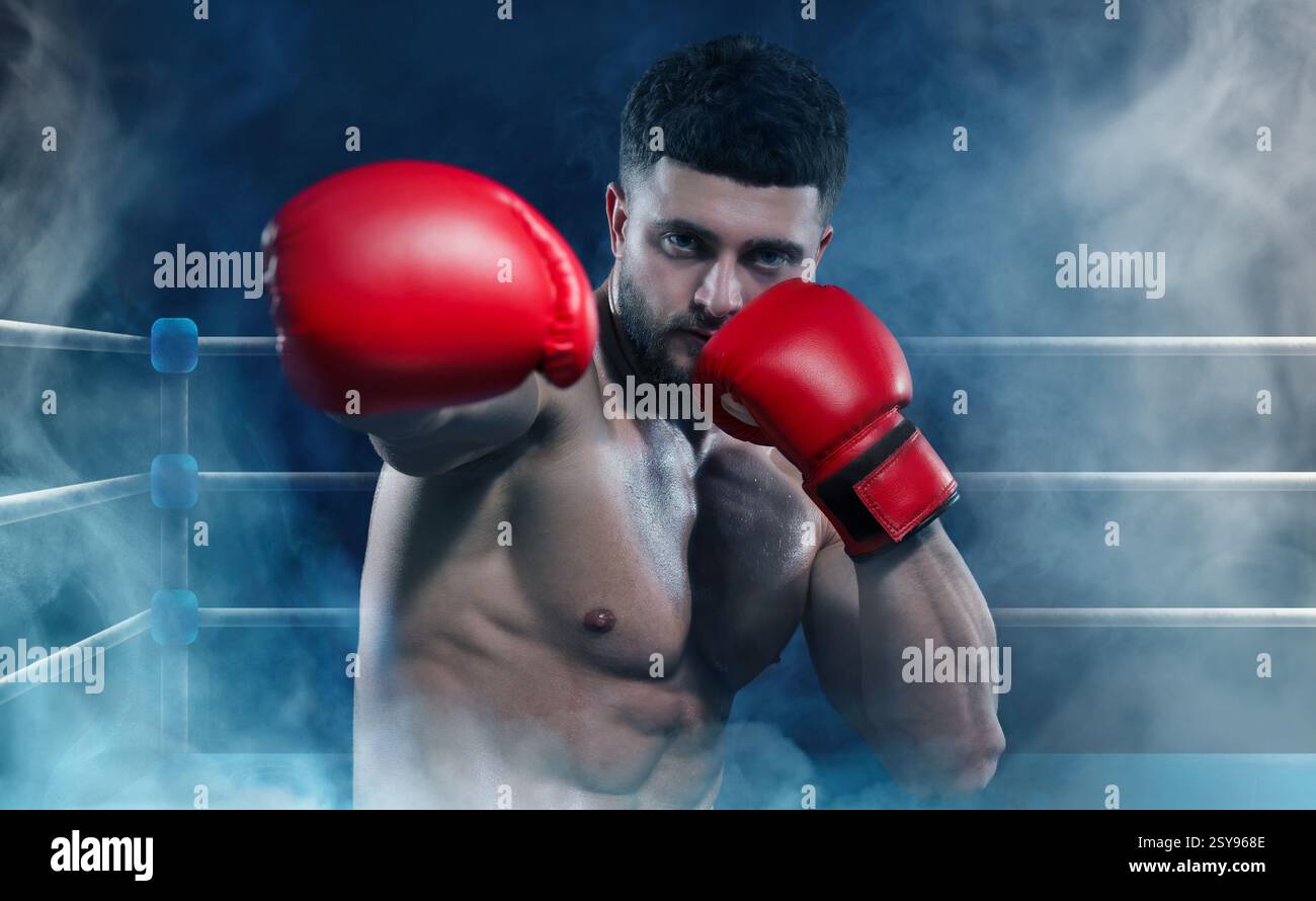 Boxer training on boxing ring in color smoke Stock Photo - Alamy