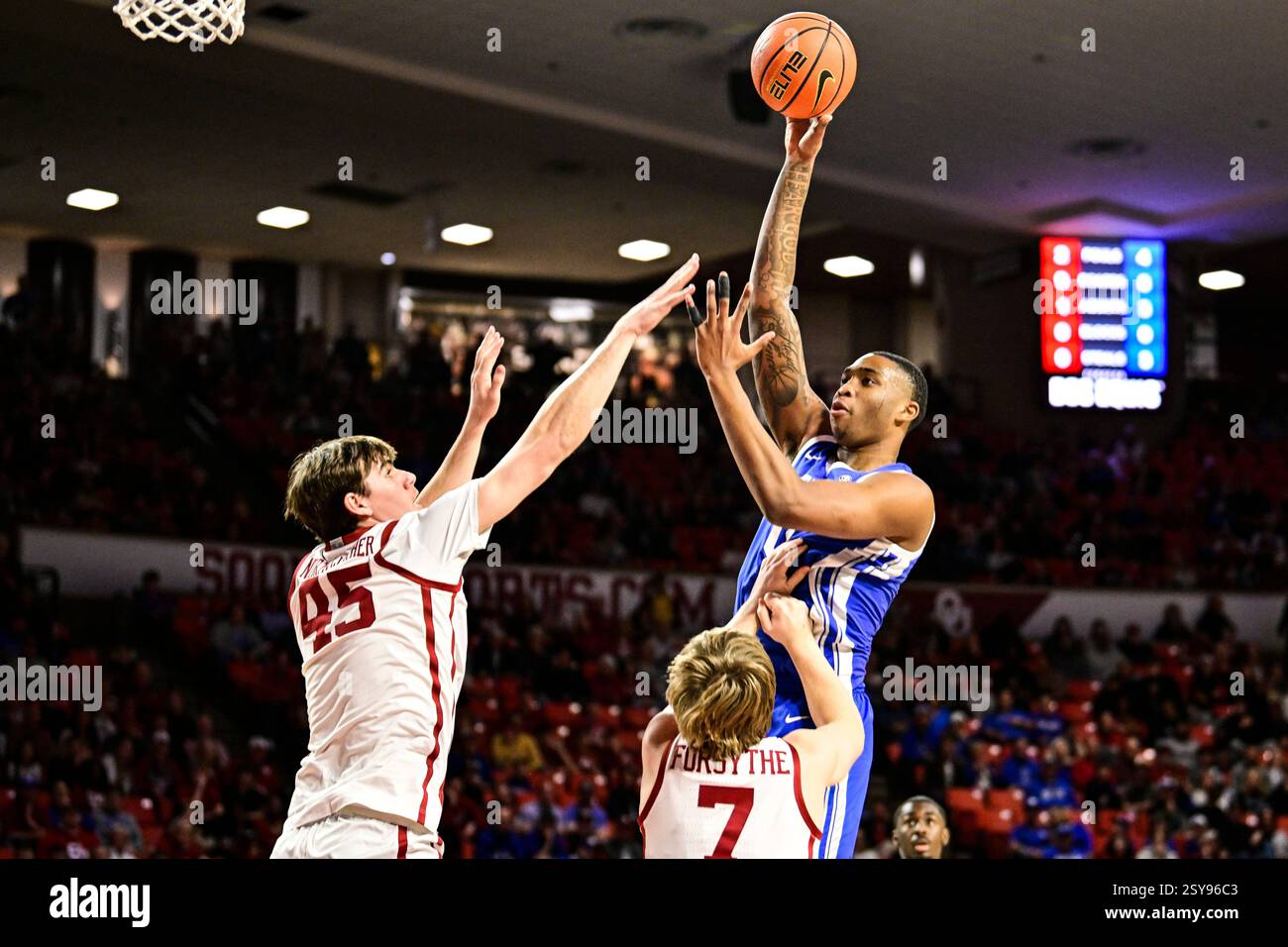 Kentucky forward Brandon Garrison (10) shoots over Oklahoma forward ...