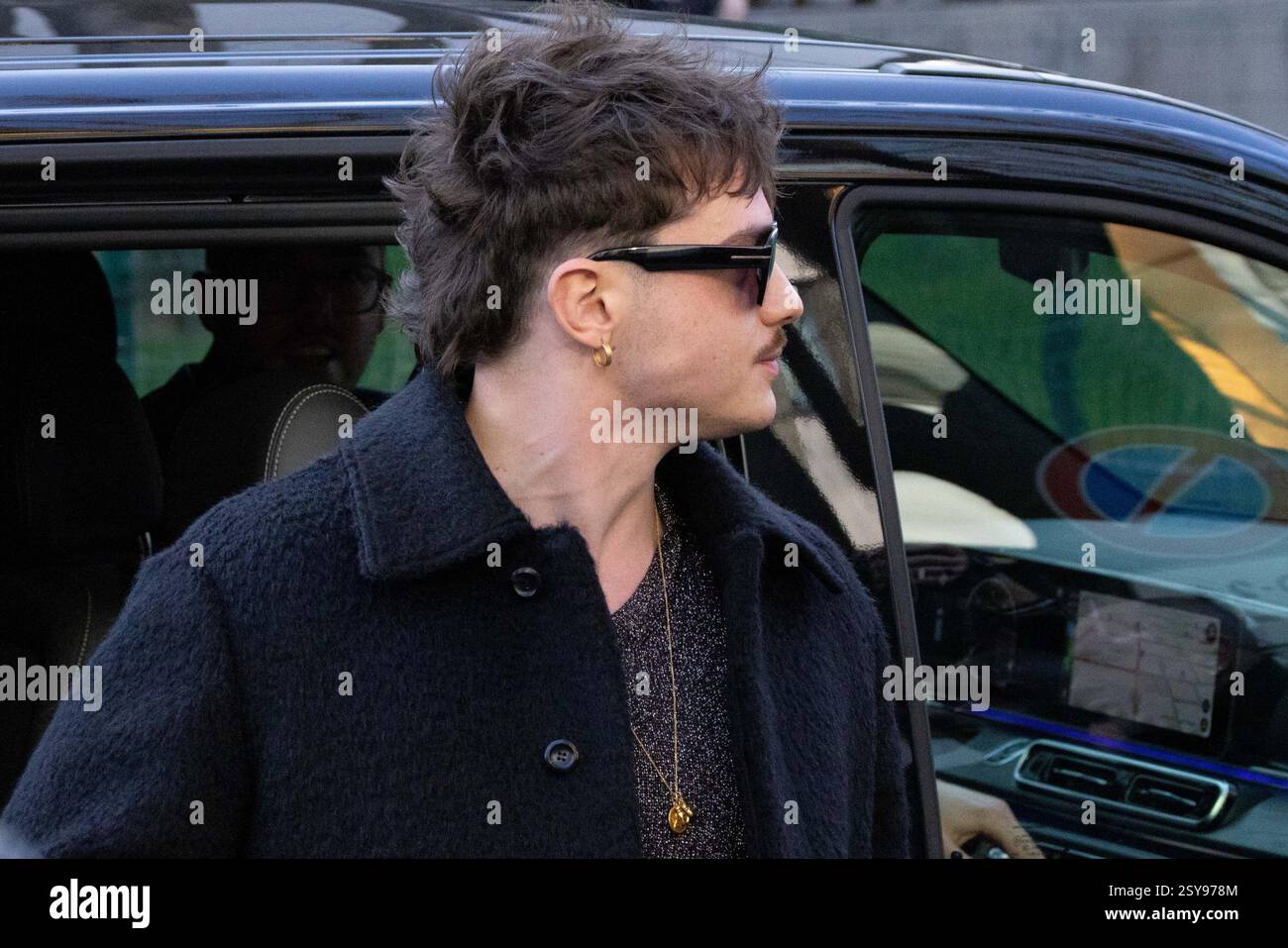 Olly is seen arriving at the Emporio Armani fashion show during the ...