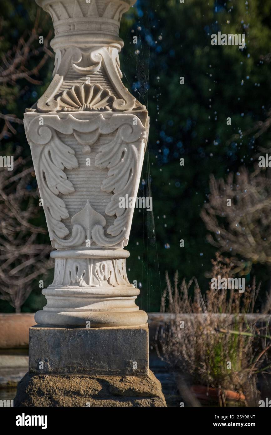 Marble carved base detail with droplets Stock Photo - Alamy