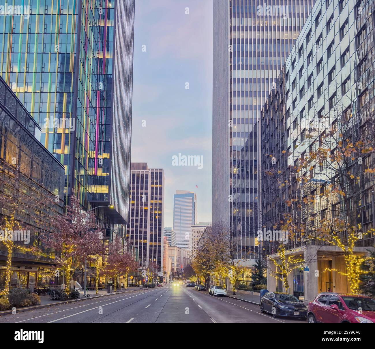The image captures a street in Seattle downtown lined with tall ...