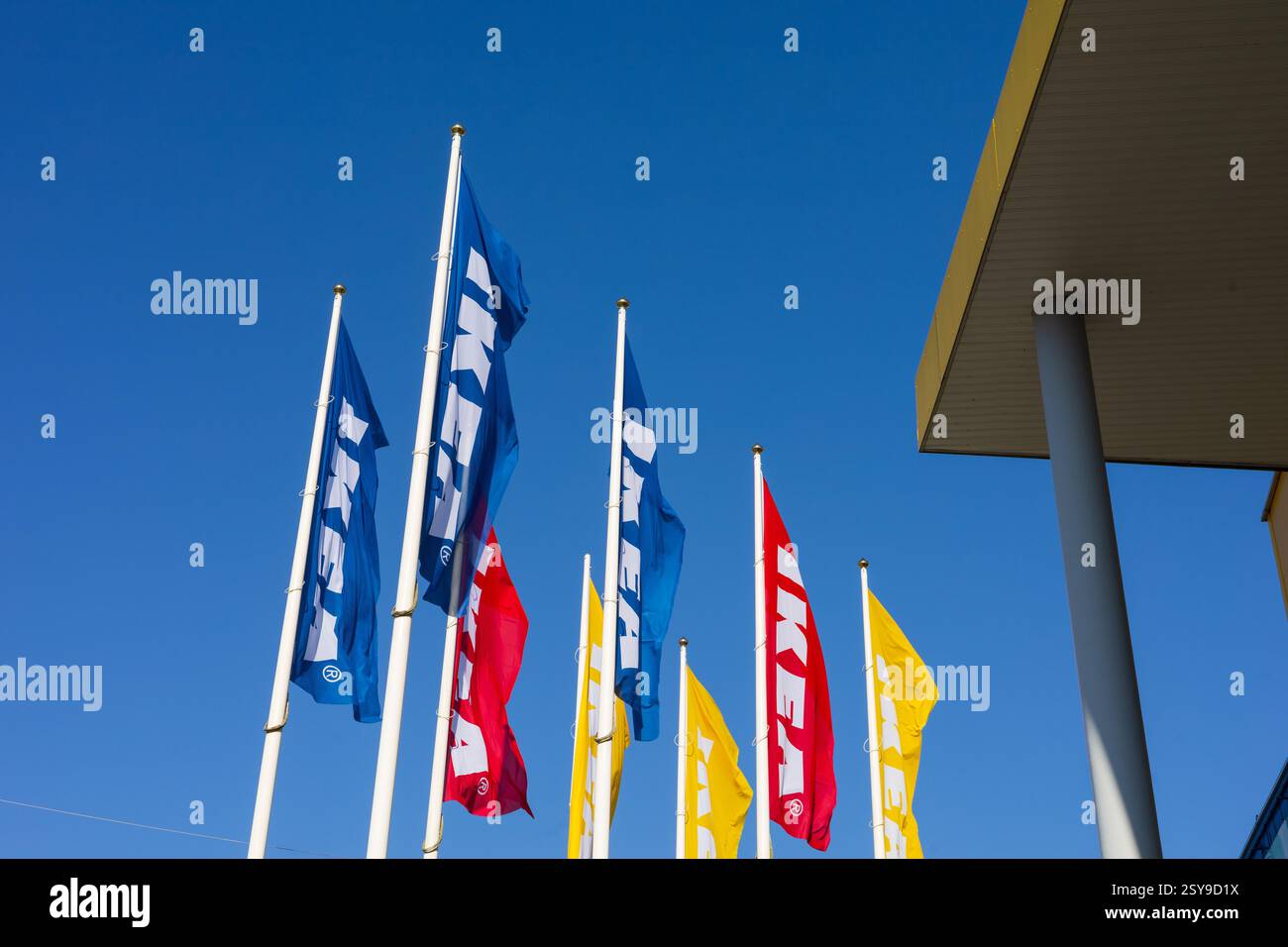 Ikea, Ostrava, Czechia - February 22, 2025. Waving flag and banner with ...