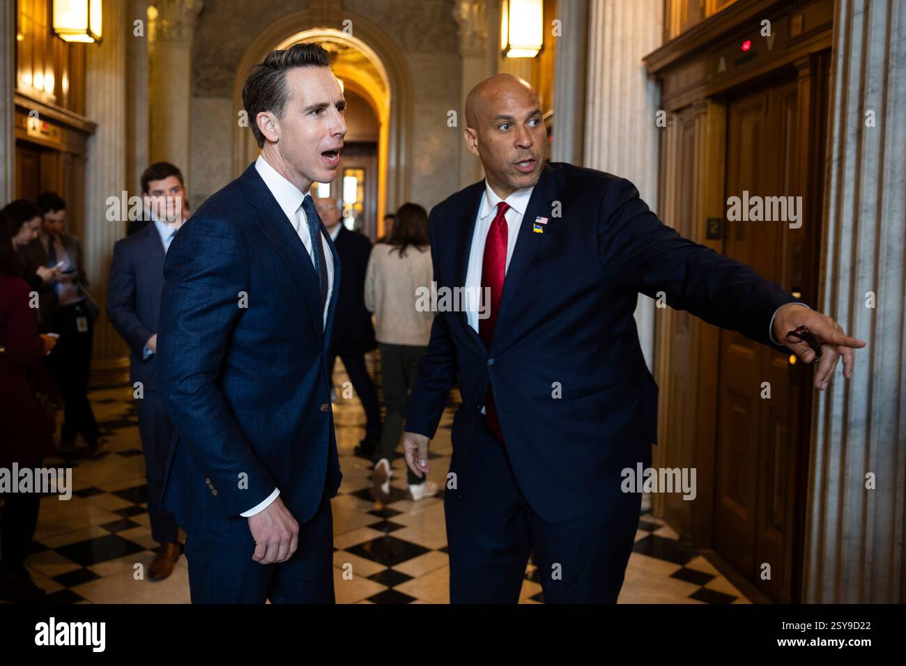 Sens. Josh Hawley (R-Mo.) and Cory Booker (D-N.J.) are seen at the U.S ...