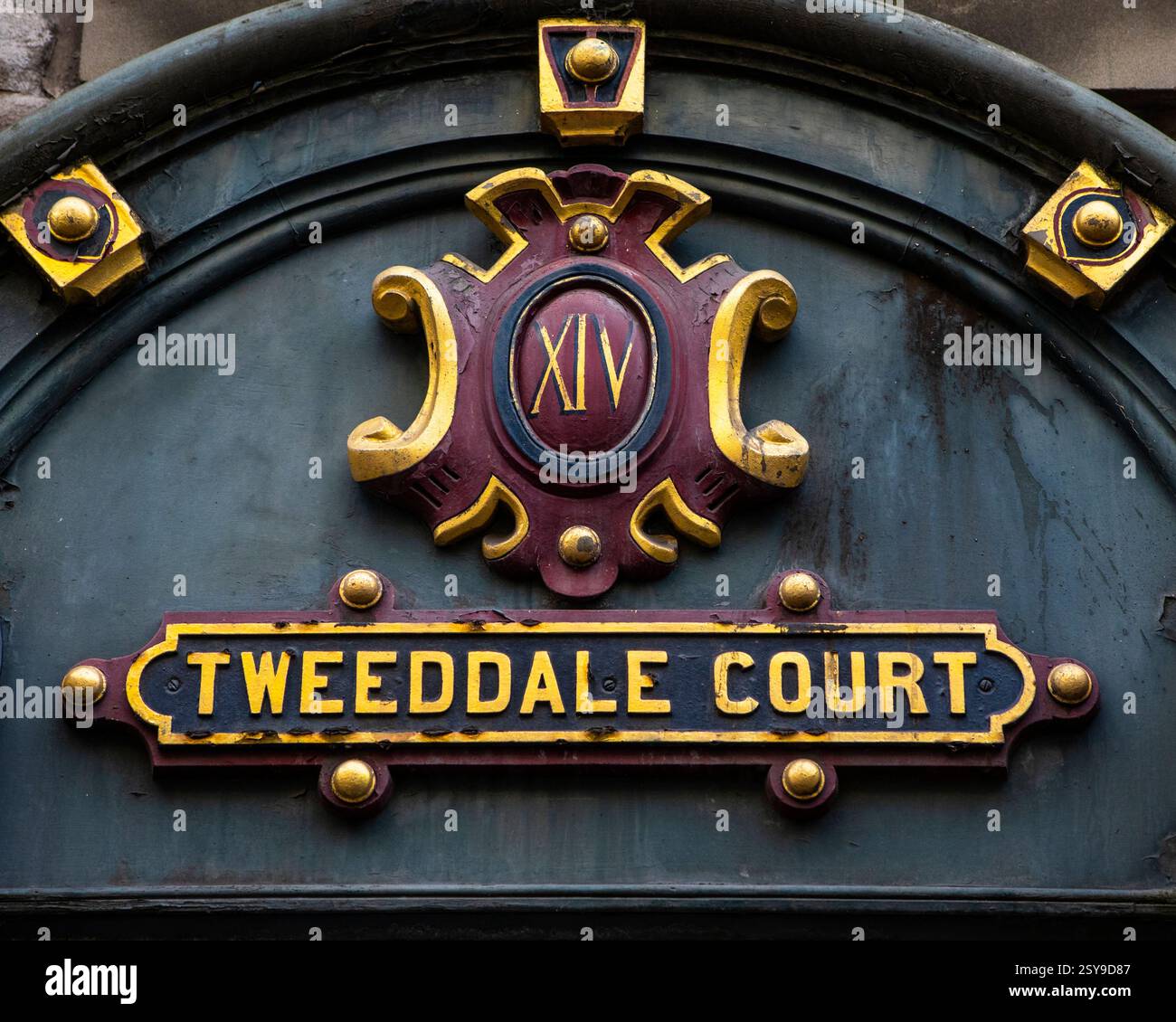 The sign above the entrance to Tweedale Court in the old town area of ...