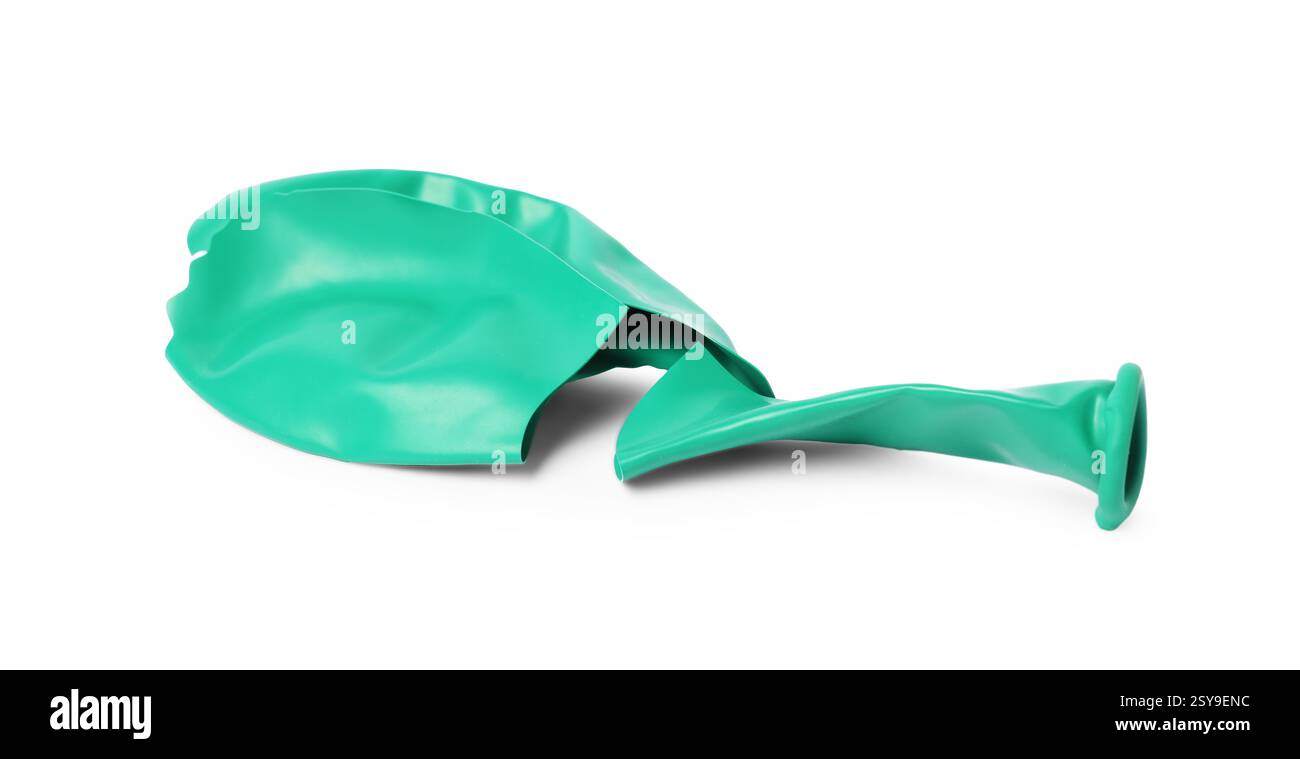One green popped balloon isolated on white Stock Photo - Alamy