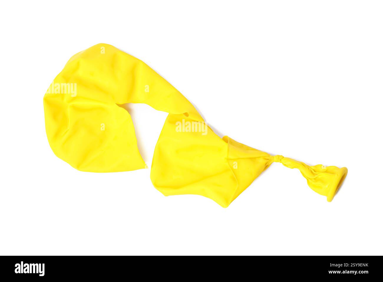 One yellow popped balloon isolated on white Stock Photo - Alamy