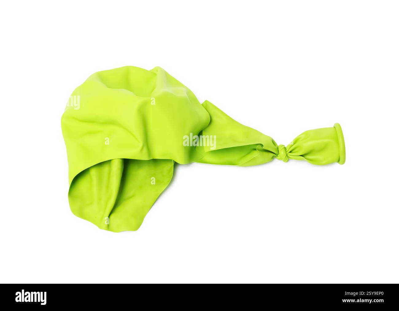 One green popped balloon isolated on white Stock Photo - Alamy