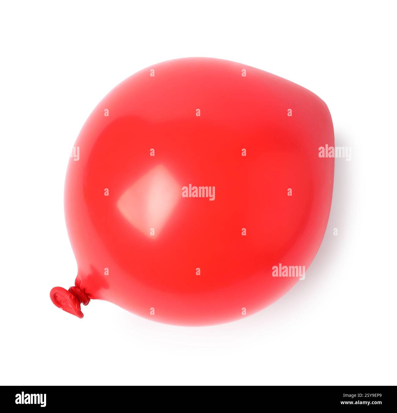 One red half deflated balloon isolated on white, top view Stock Photo ...