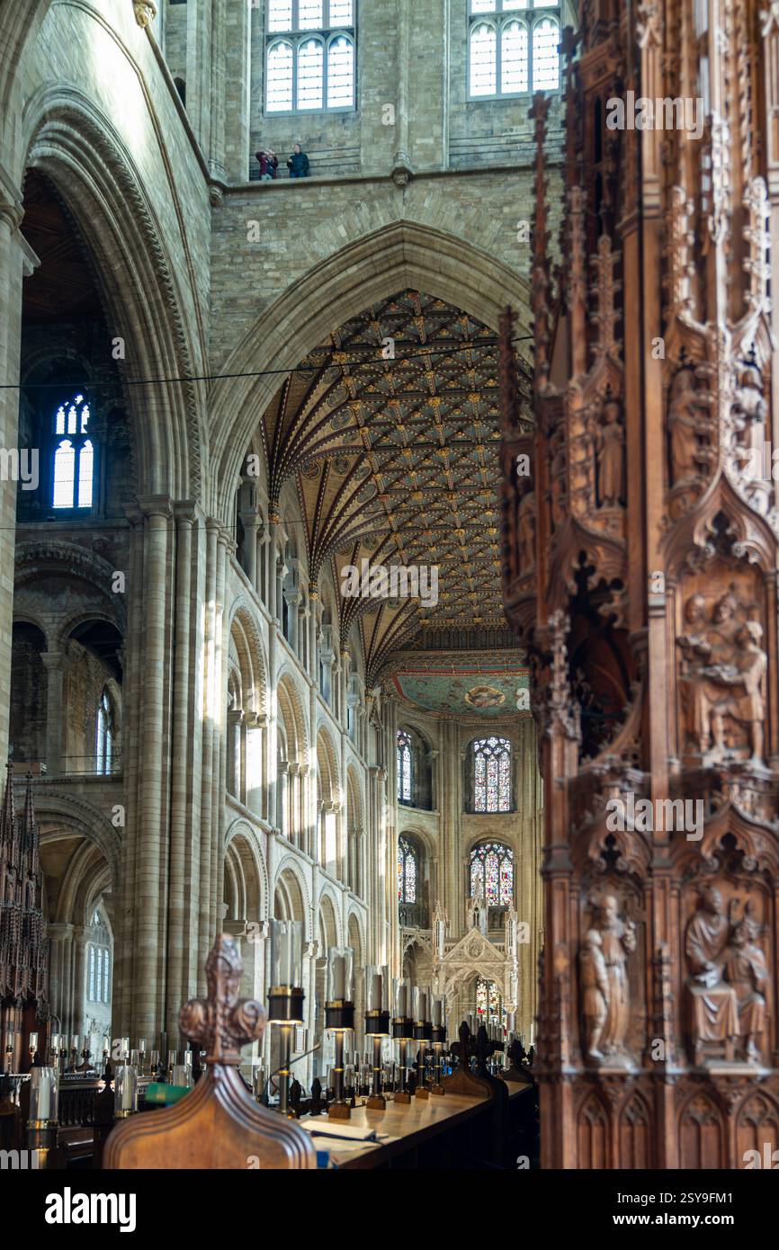 Intricate details of the nave ceiling and a richly carved wooden ...