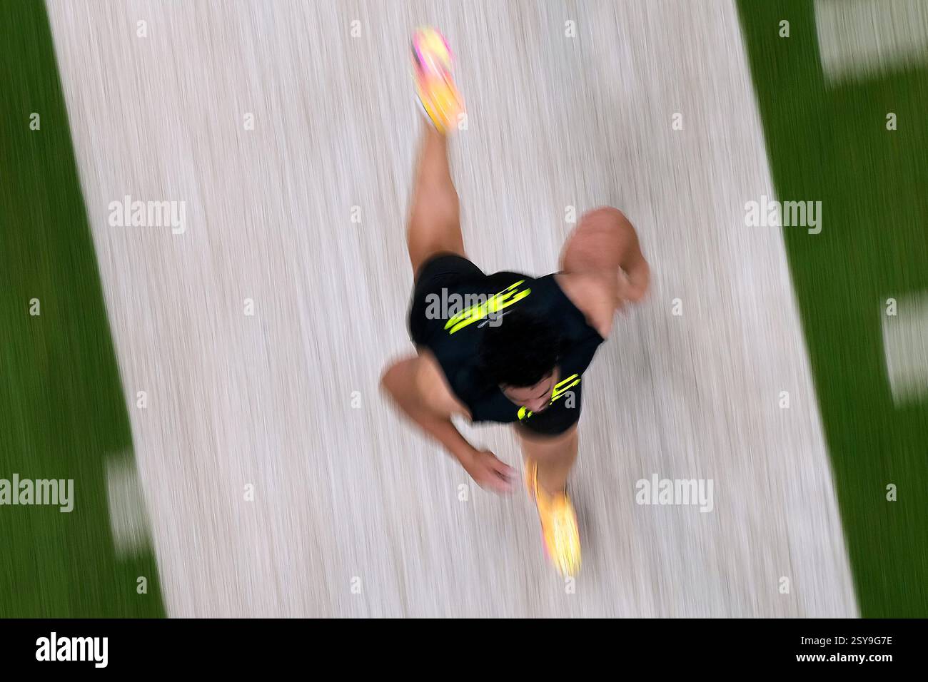 Utah defensive lineman Junior Tafuna runs in the 40-yard dash at the ...