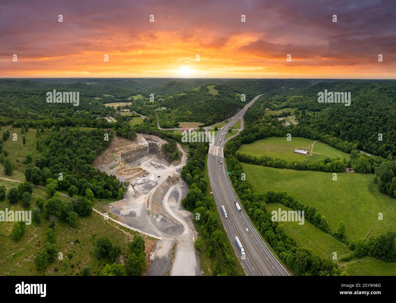 Industrial open-pit mining site with limestone quarry at mountain ...