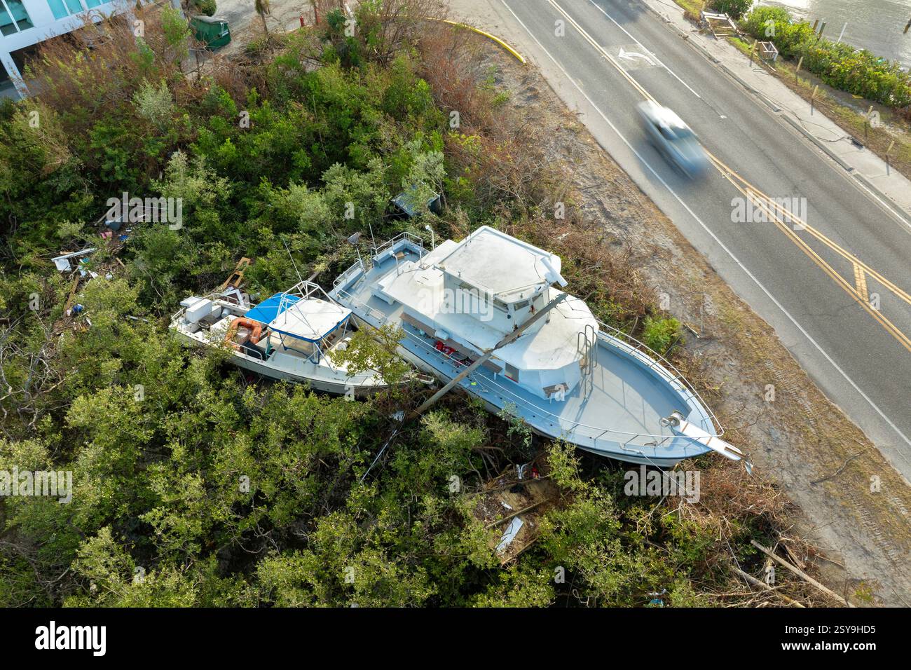 Natural disaster aftermath. Destroyed yachts after hurricane Milton on ...