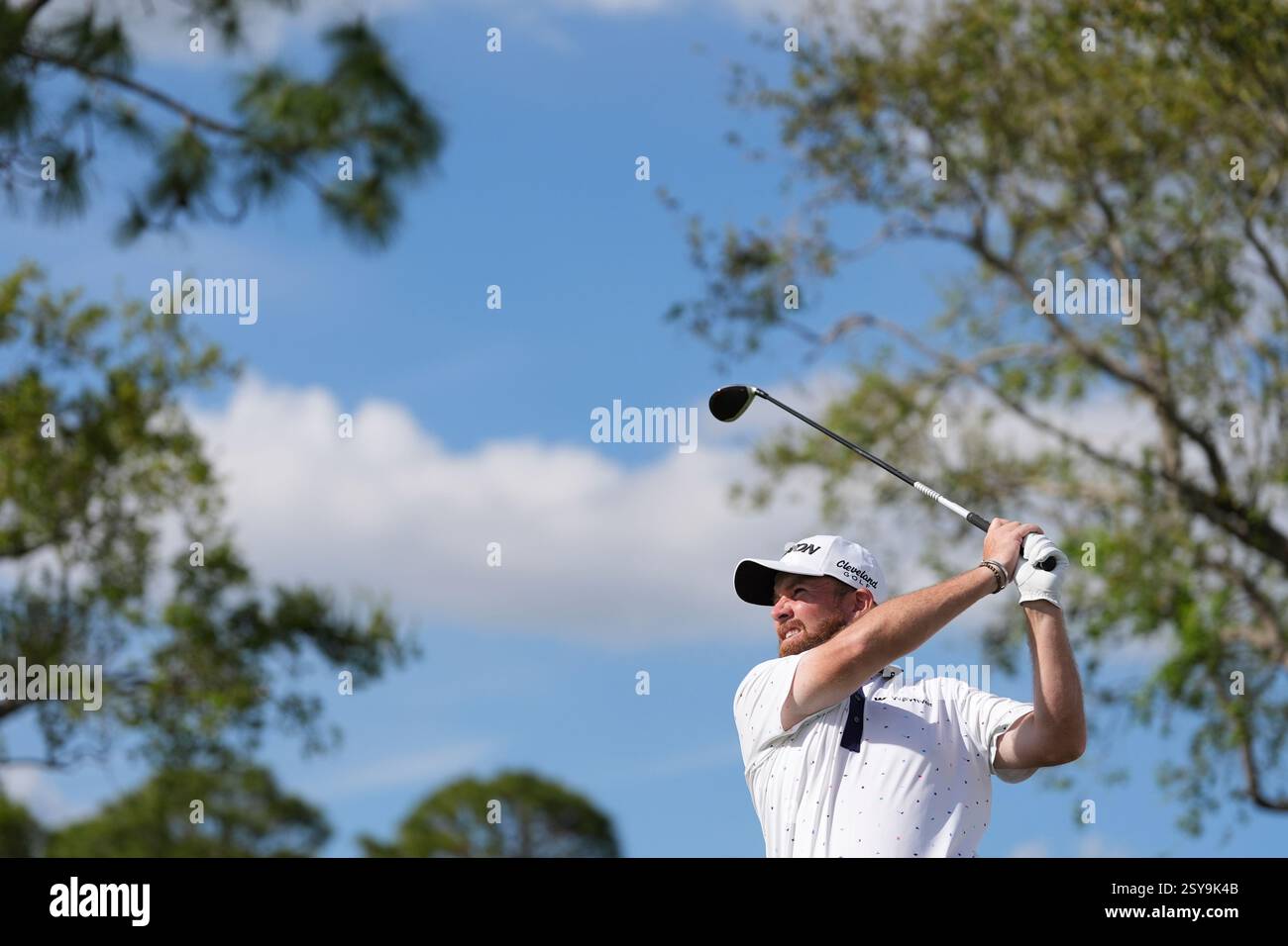 Shane Lowry watches his tee shot on the 11th hole during the first ...