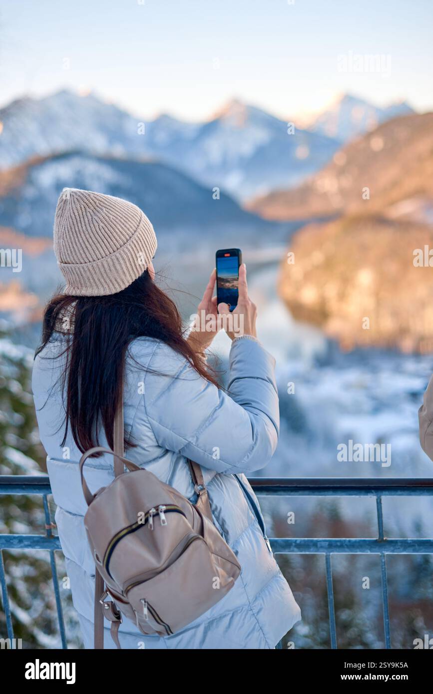 This high-resolution photograph captures a young woman standing ...